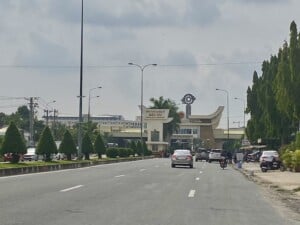Vietnam-Cambodia, Mộc Bài-Bavet Border Crossing - A Bus On a Dusty Road