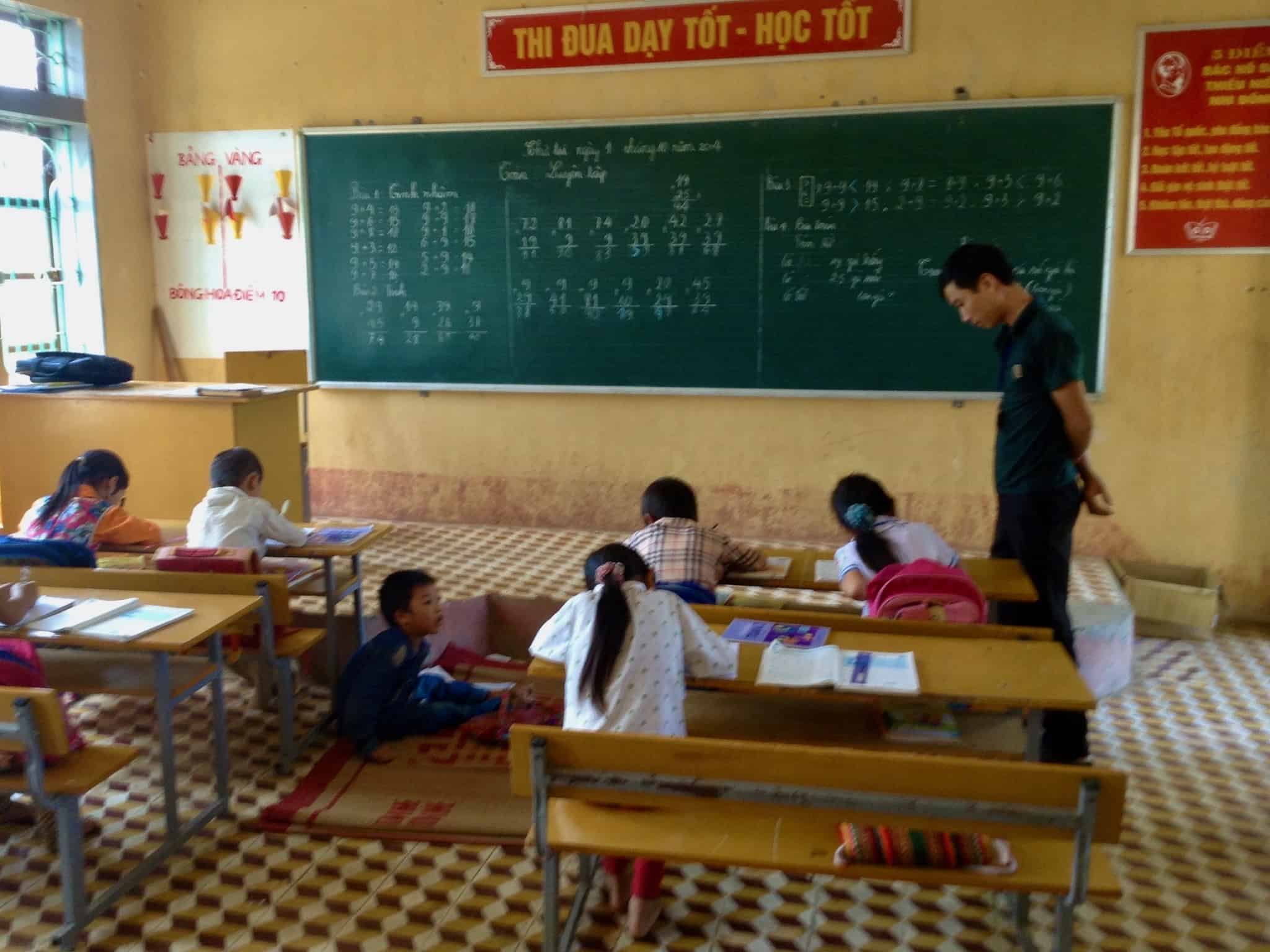 Helping Students Learn & Grow - Vietnamese Schools - A Bus On a Dusty Road