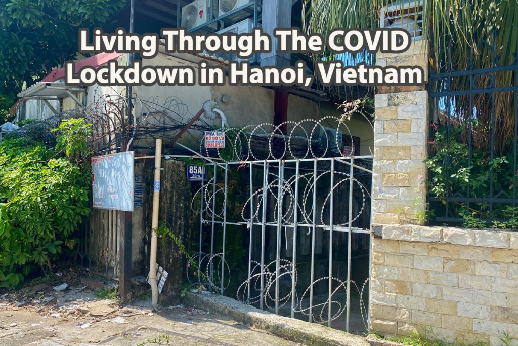 Living Through The COVID Lockdown in Hanoi, Vietnam - A Bus On a Dusty Road