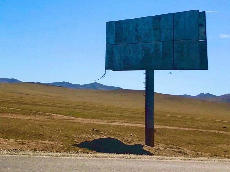 What Does “Wind Behind Someone’s Sails” Mean? - A Bus On a Dusty Road