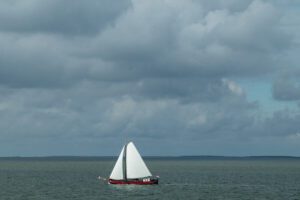 Wind Awareness: Critical Skill For Any Sailor - A Bus On a Dusty Road