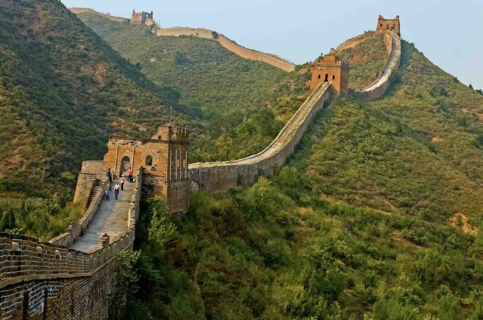 How Much Does The Great Wall Of China Weigh? - A Bus On a Dusty Road